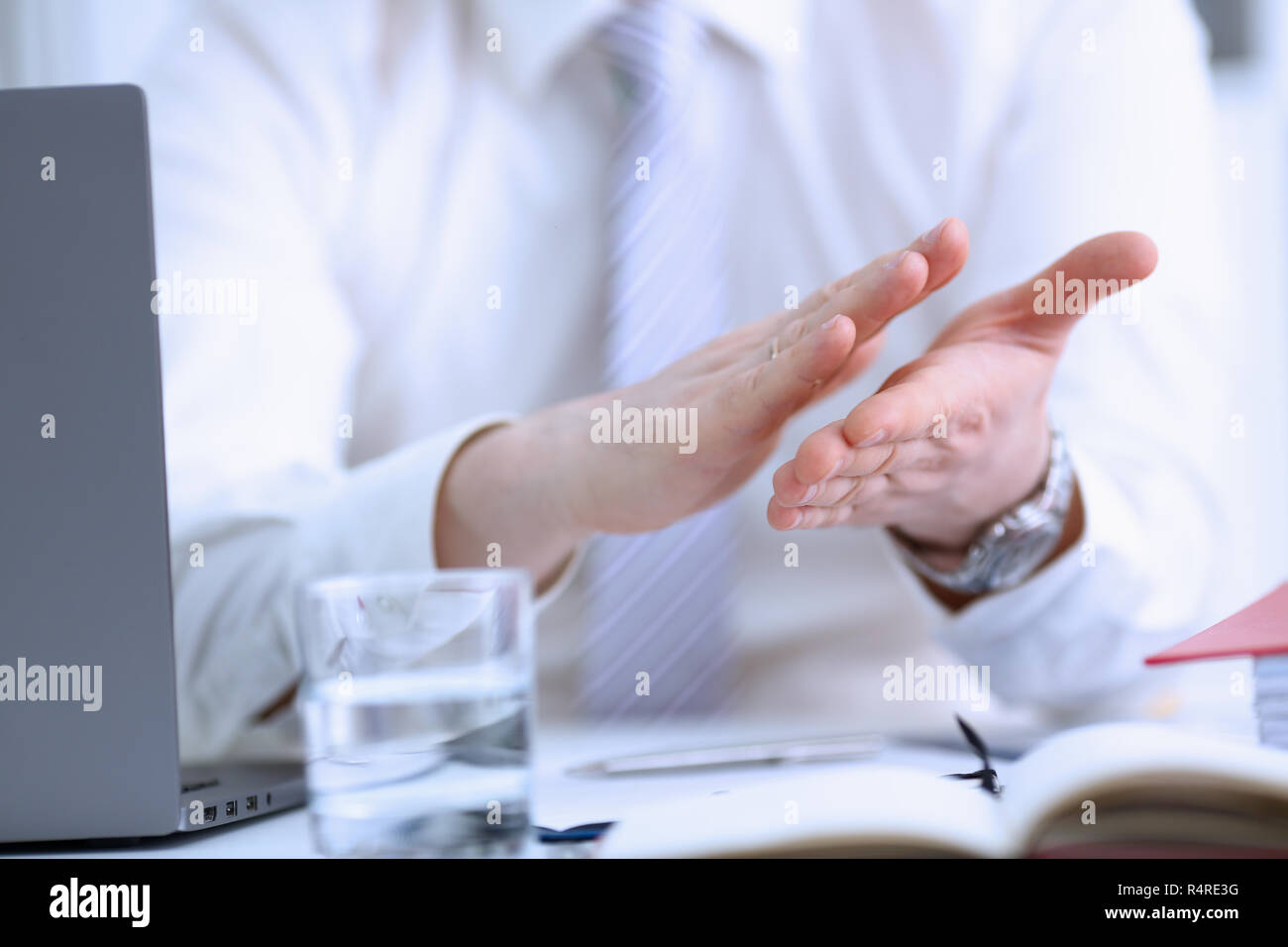 Man in suit clap his arms congrats Stock Photo - Alamy