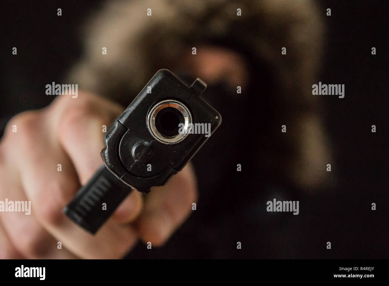 guy shooting at the camera Stock Photo - Alamy