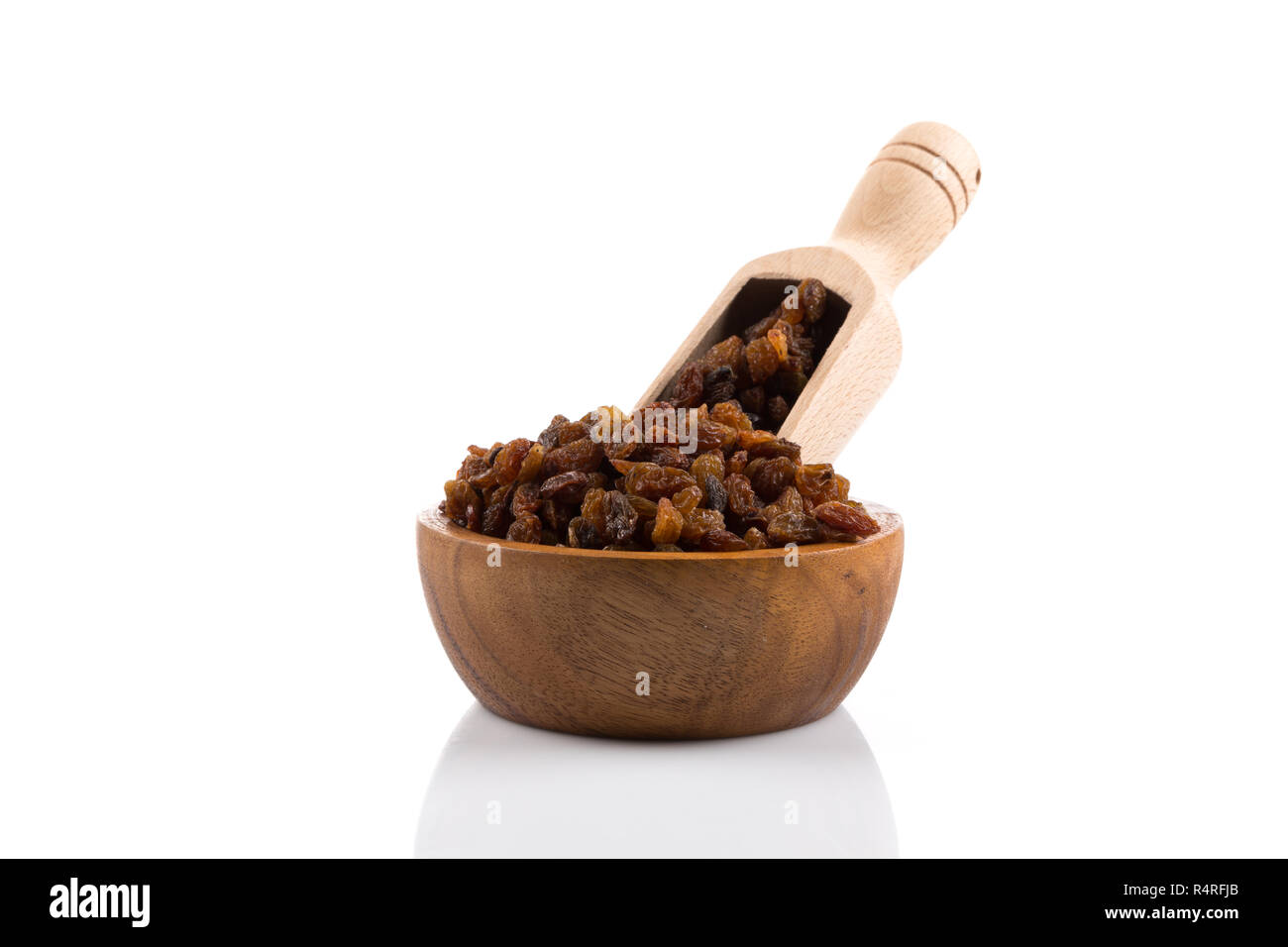 Sweet raisins on white Stock Photo - Alamy