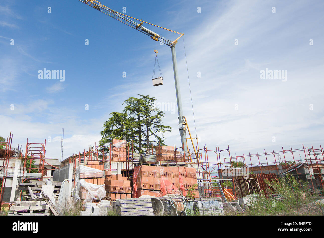Small construction site with houses under construction Stock Photo - Alamy