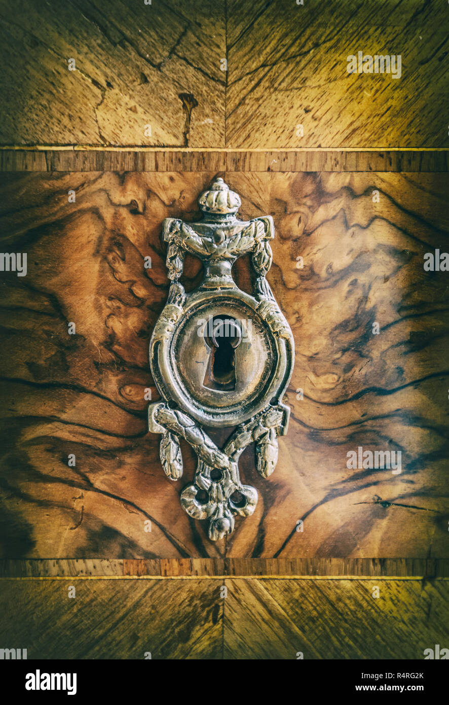 Antique metal keyhole Stock Photo - Alamy
