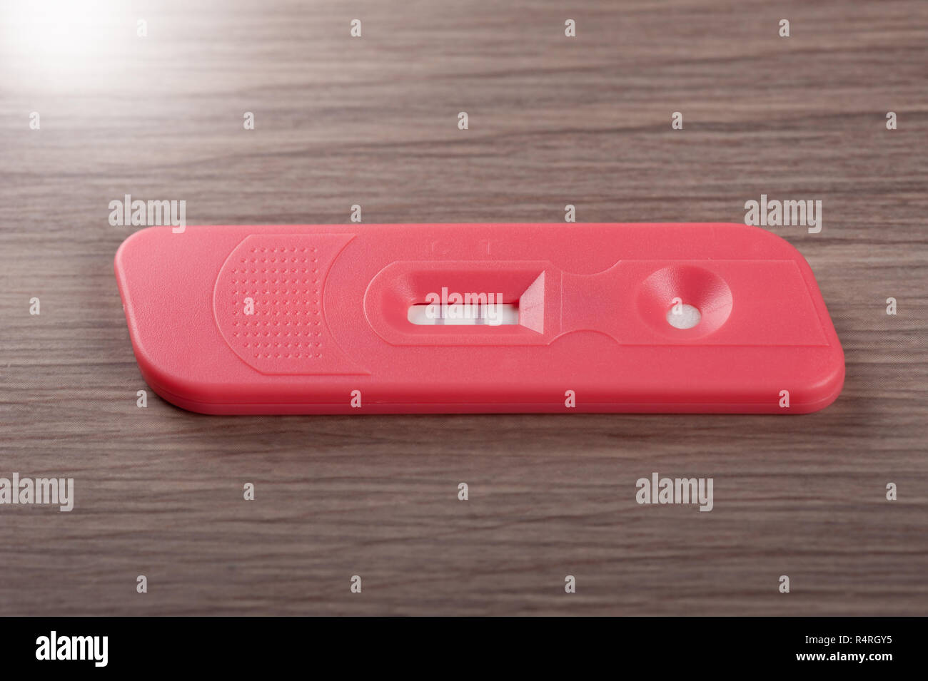 closeup pregnancy test with positive pregnant Stock Photo - Alamy