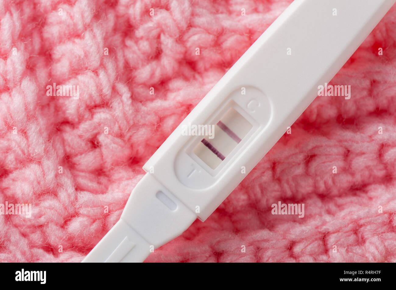 closeup pregnancy test with positive pregnant Stock Photo - Alamy