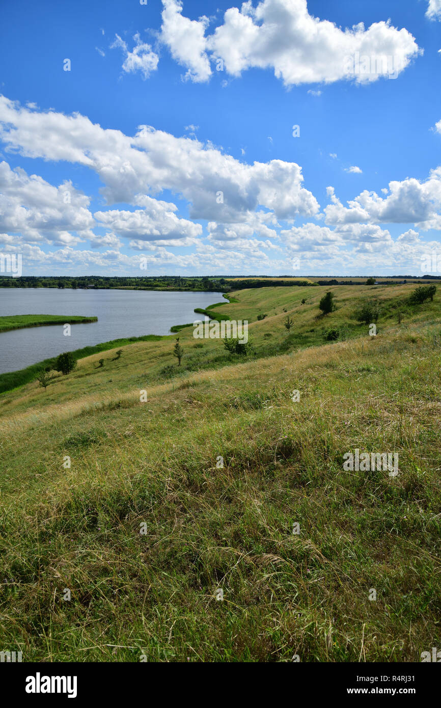 Beautiful summer countryside landscape with a lake Stock Photo - Alamy