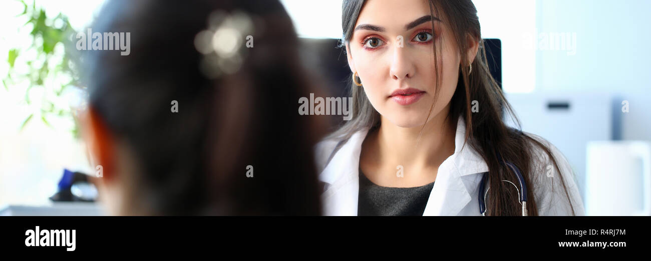Smiling beautiful female medicine doctor explain diagnosis Stock Photo ...