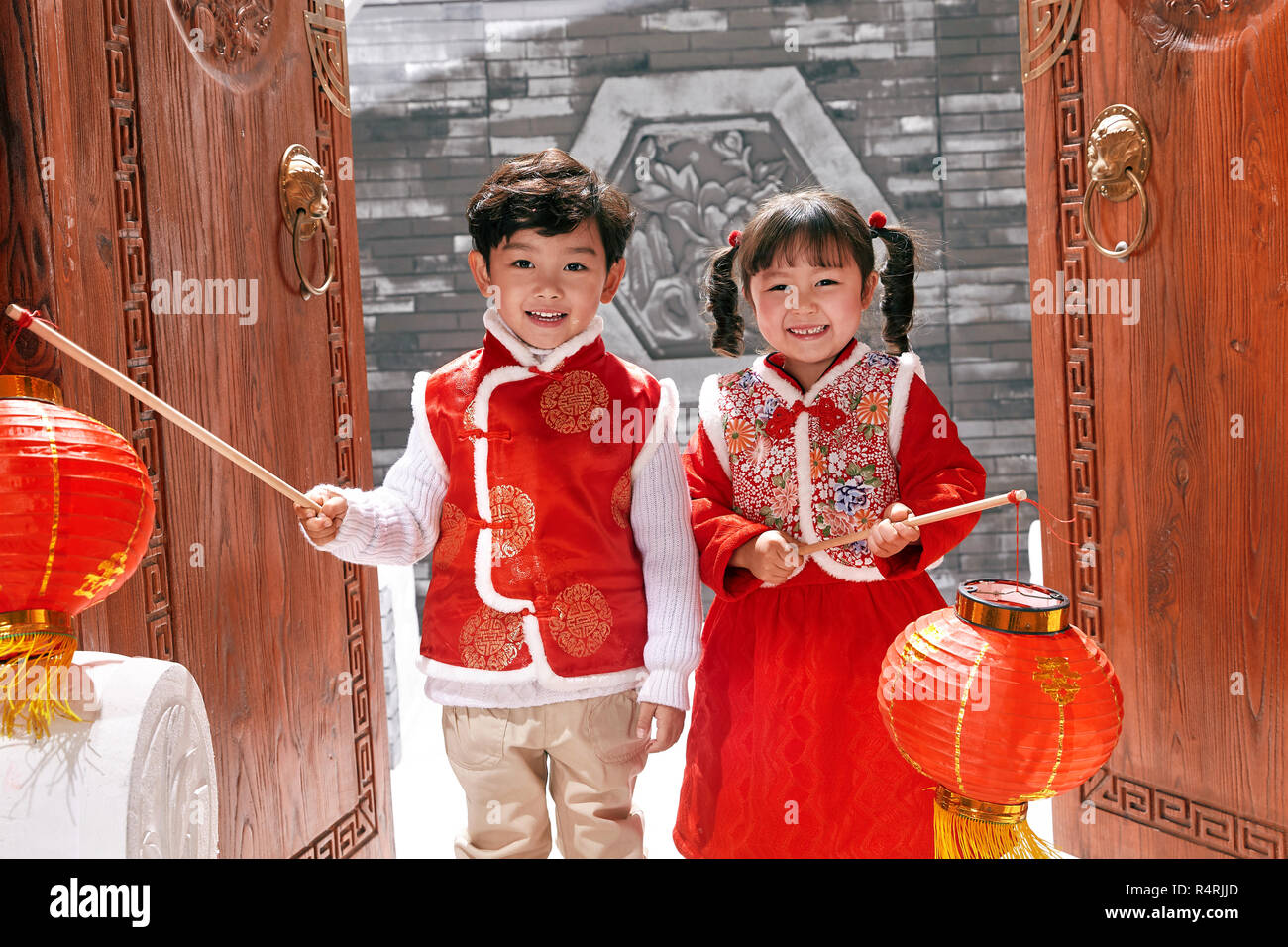 Happy boys and girls to celebrate the New Year Stock Photo - Alamy
