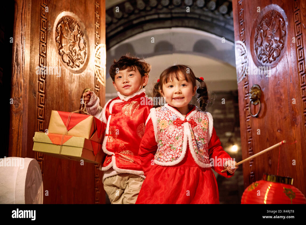 Happy boys and girls to celebrate the New Year Stock Photo - Alamy