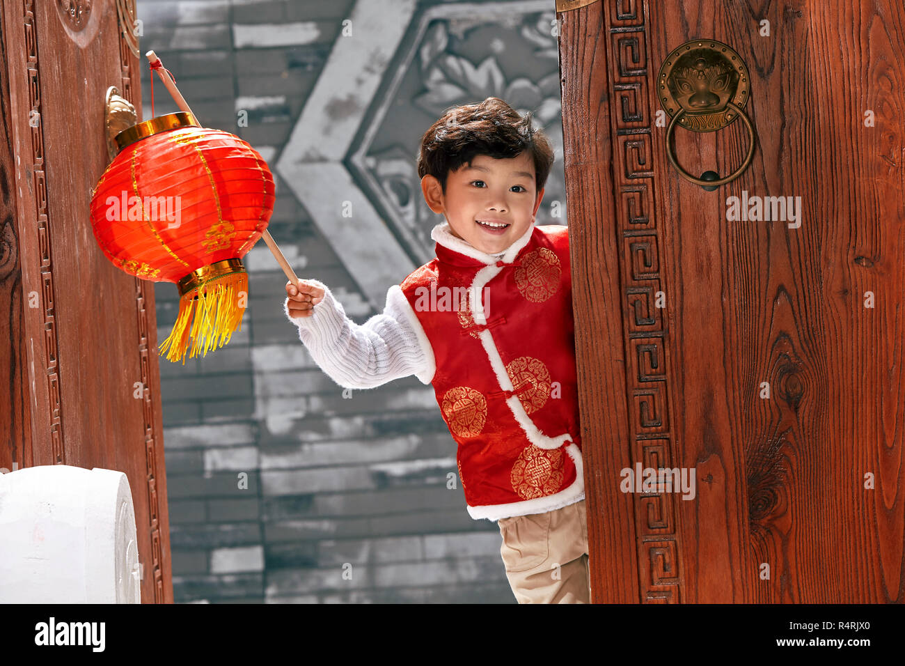 Happy chinese new year boy hi-res stock photography and images - Alamy