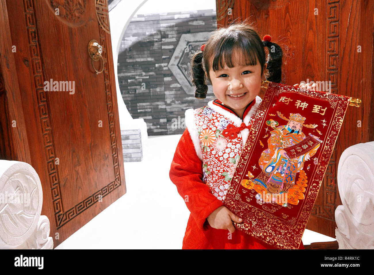 Lovely little girl celebrating the New Year Stock Photo - Alamy