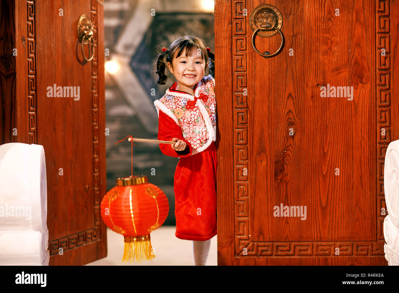Happy little girl celebrating the New Year Stock Photo - Alamy