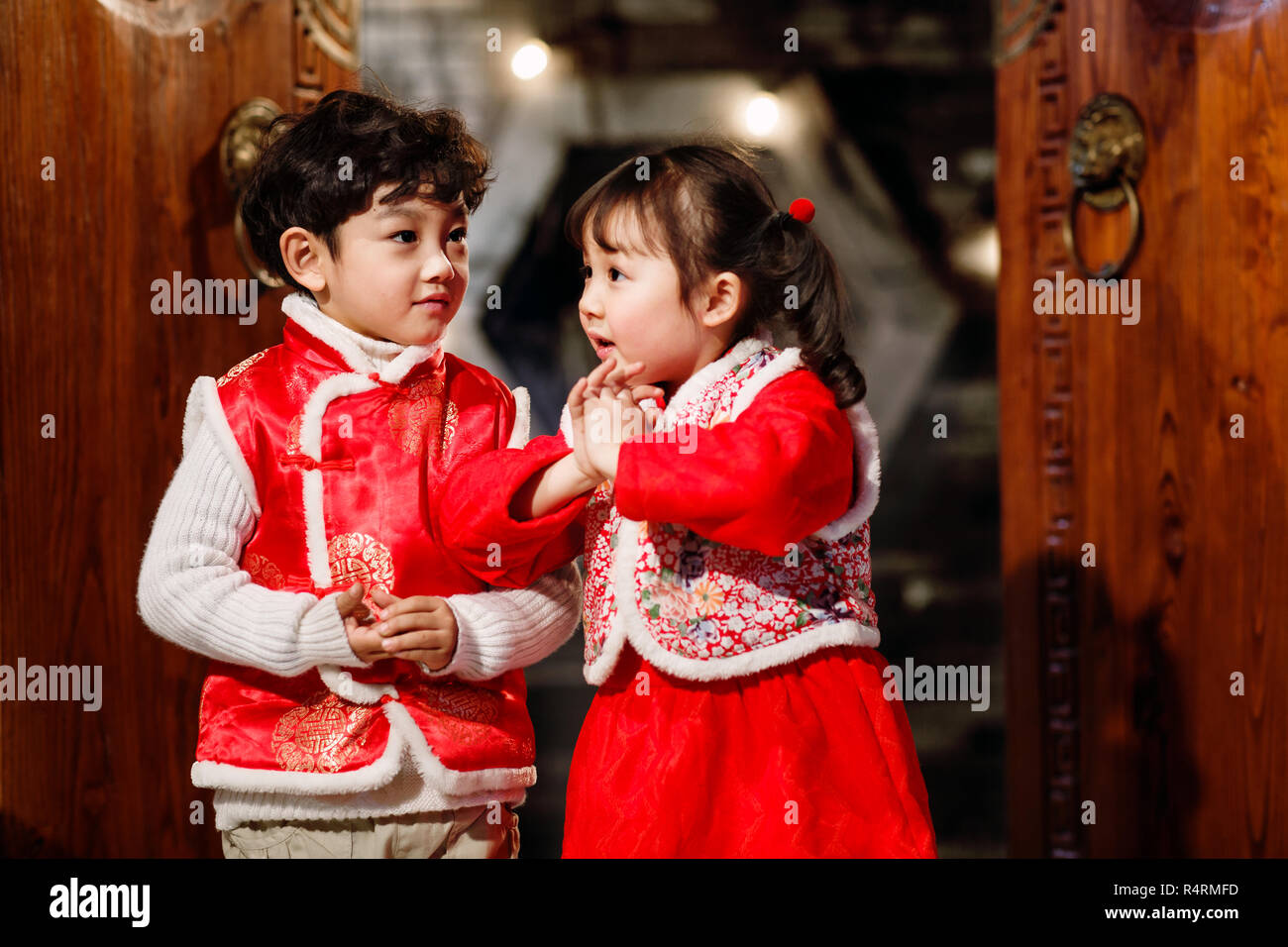 Happy boys and girls in the New Year Stock Photo - Alamy