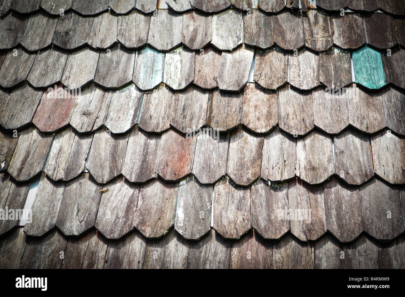 old wooden roof background or texture / wood shingle roof in poor ...