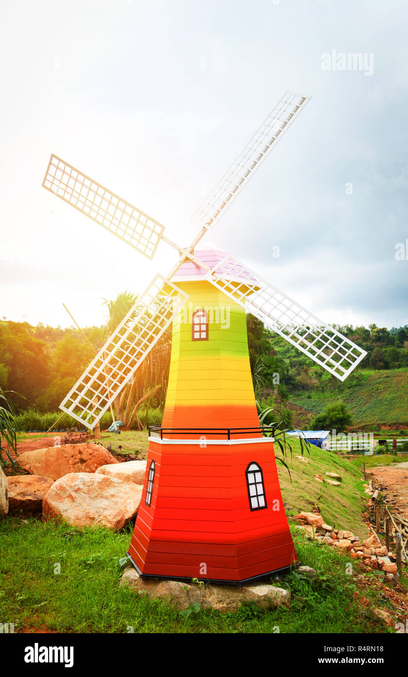 colorful windmill wind turbine in the park garden - landscape windmill ...