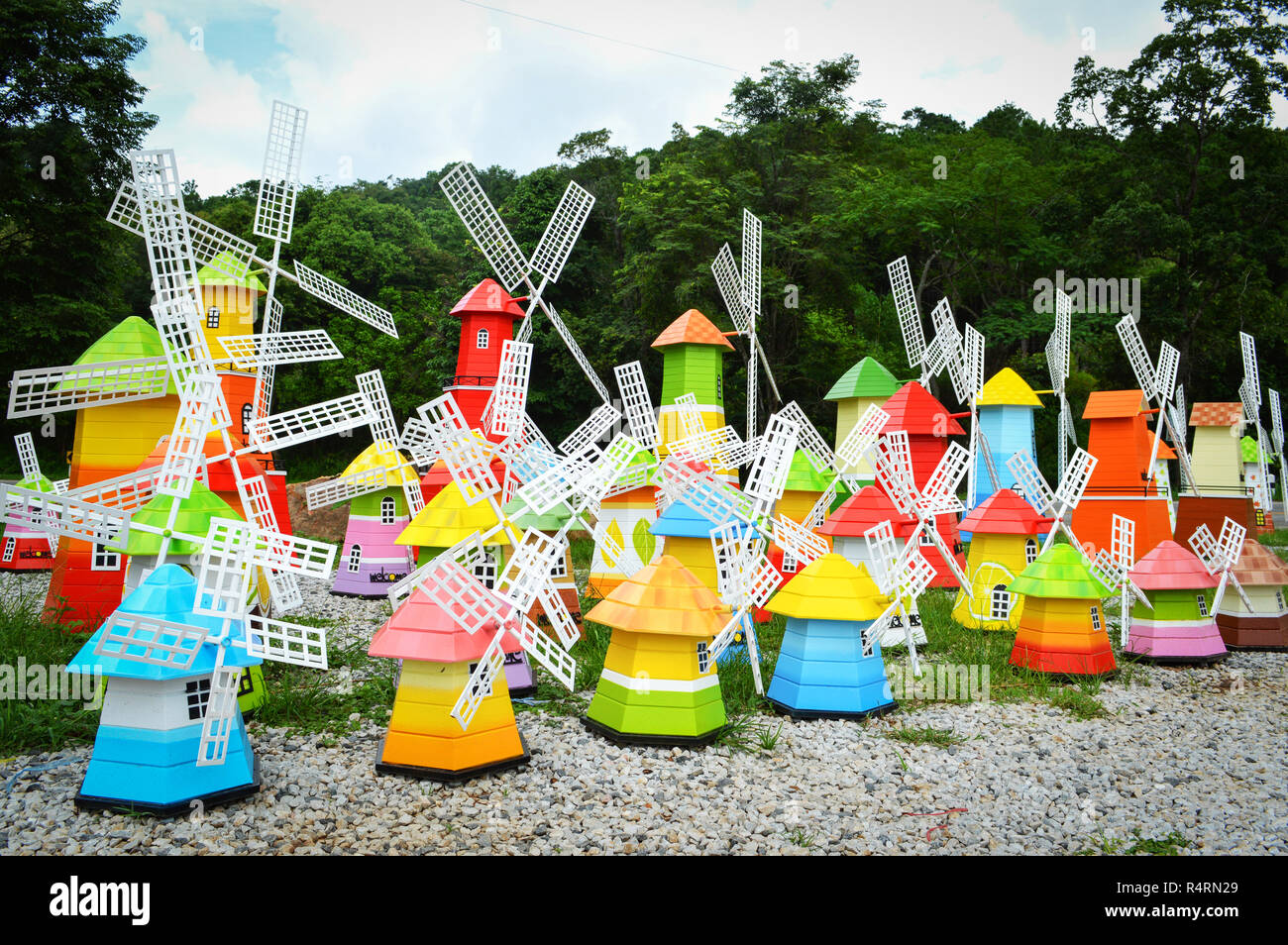 garden colorful windmill wind turbine in the park garden - landscape ...