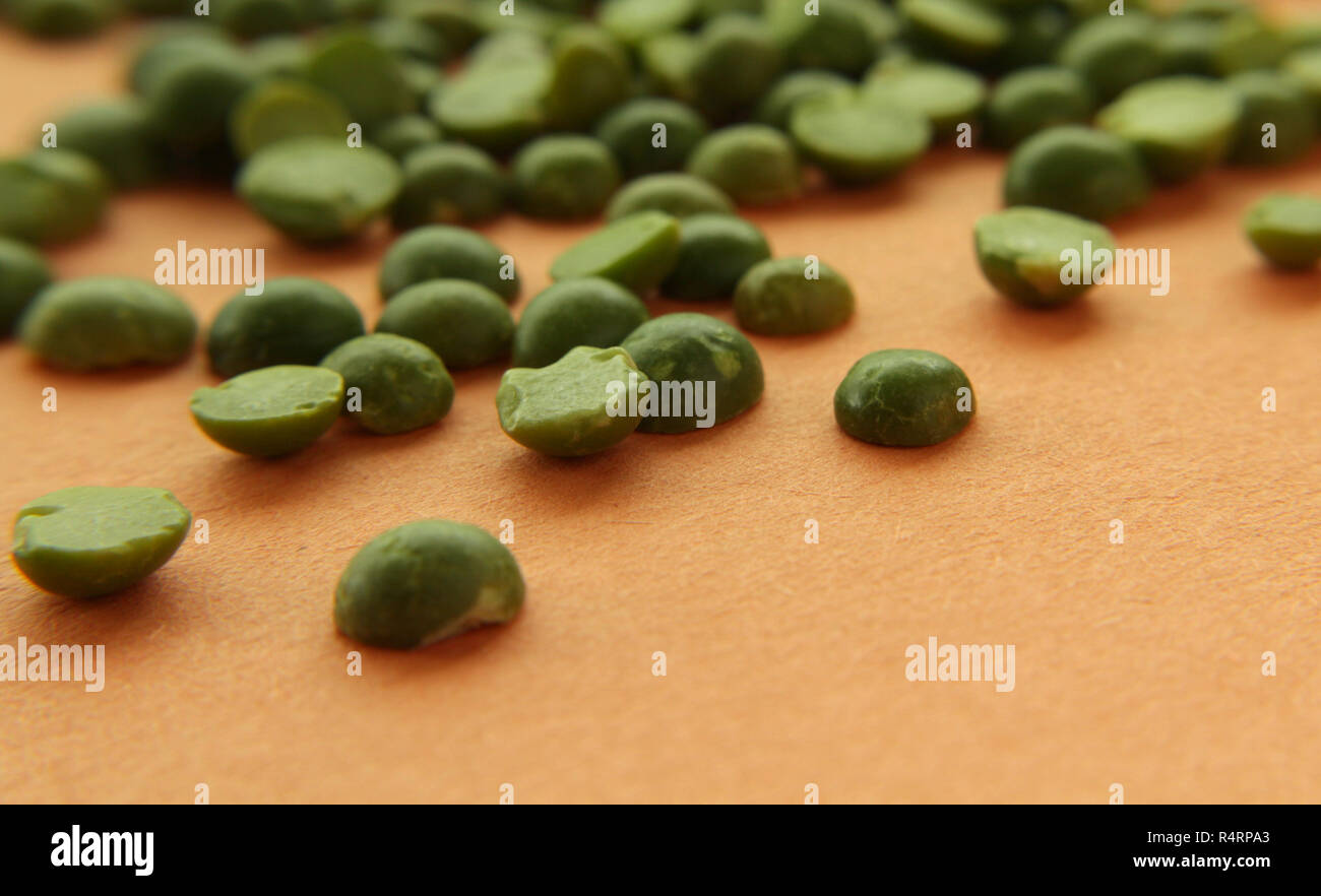 Green split peas, complementary colors Stock Photo - Alamy