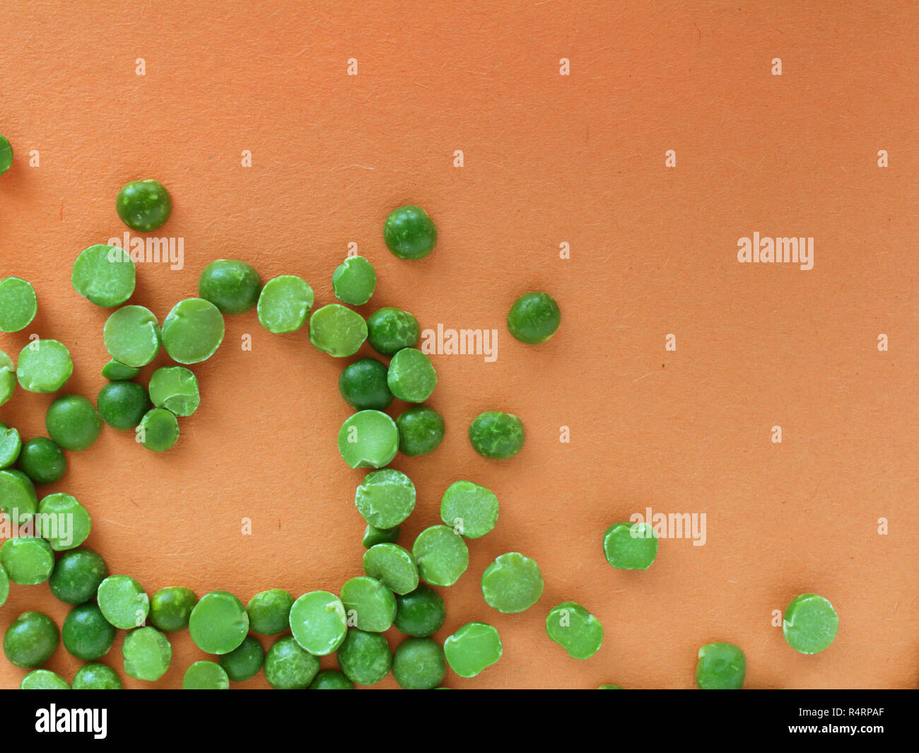 Green split peas, complementary colors Stock Photo - Alamy