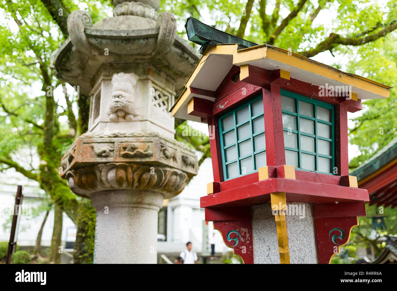 Japanese stone and wooden lantern in temple Stock Photo - Alamy