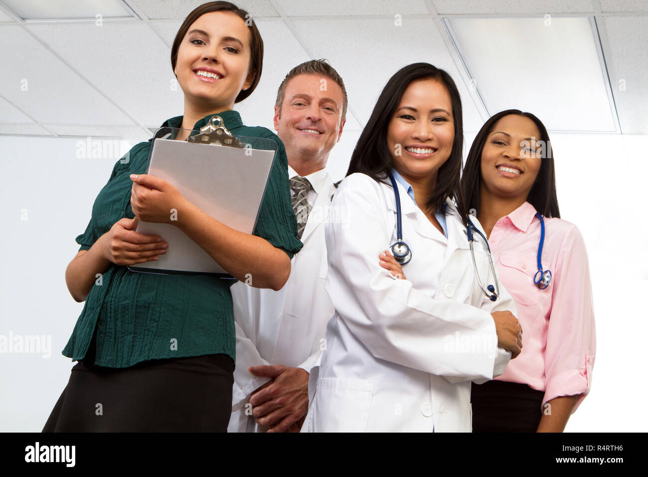 Diverse group of medical healthcare providers isolated on white Stock ...