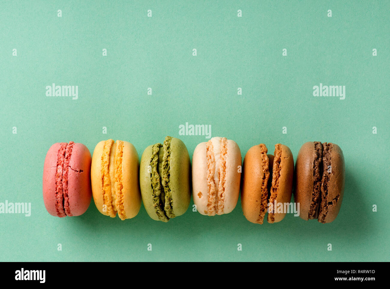 Macarons in line Stock Photo - Alamy