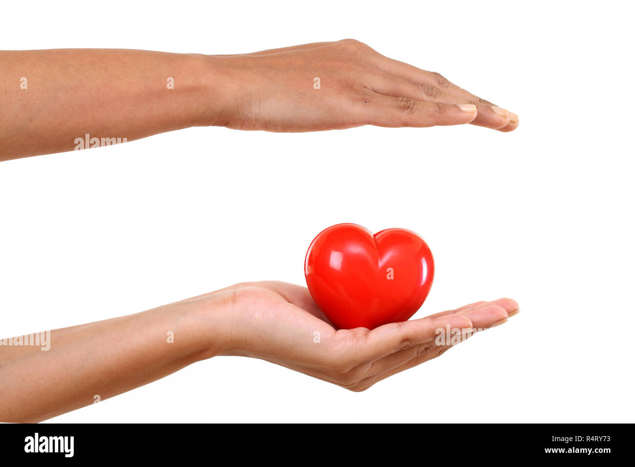 Hand holding Red heart shape Stock Photo - Alamy