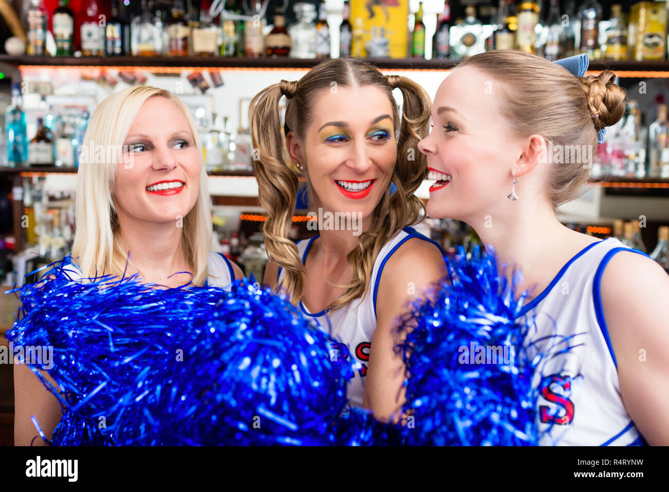 Woman cheering at bar hi-res stock photography and images - Alamy