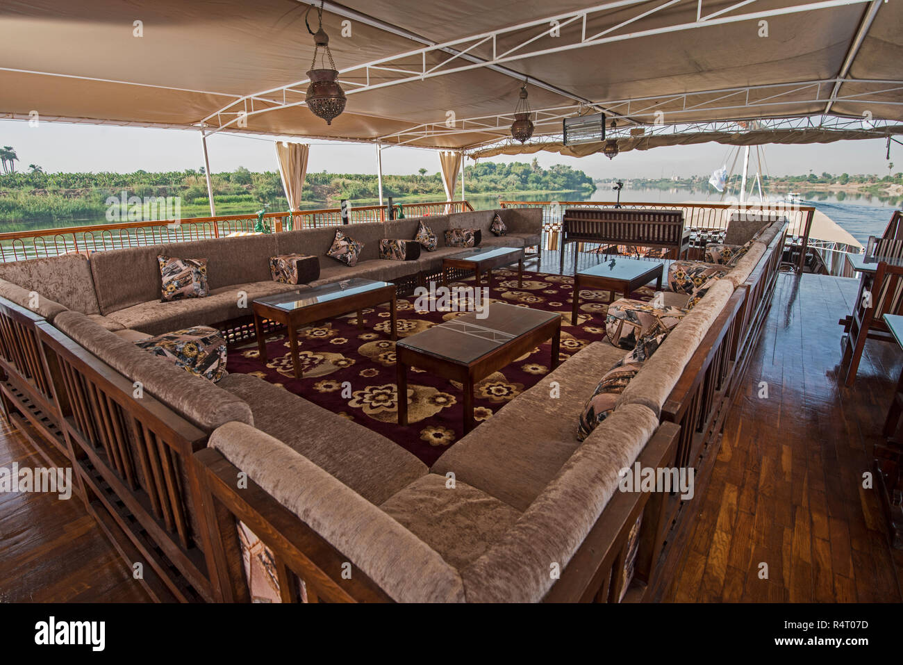 Seating sofa and table on the sundeck of a nile river cruise boat with ...