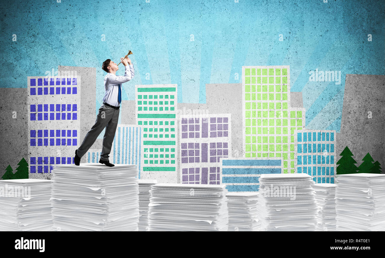 Happy businessman playing fife Stock Photo - Alamy