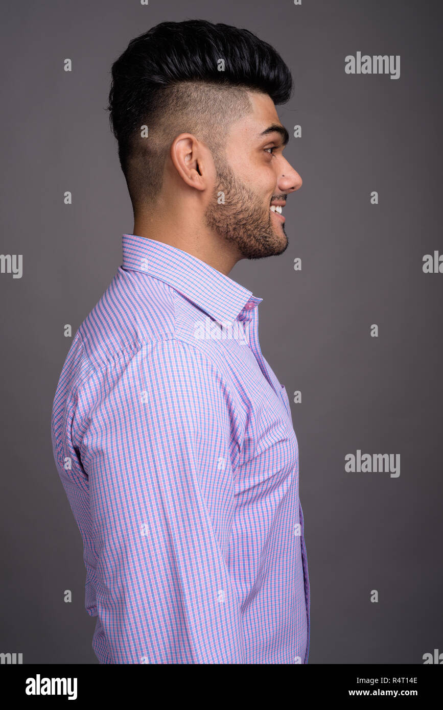 Indian man smiling side profile hi-res stock photography and images - Alamy