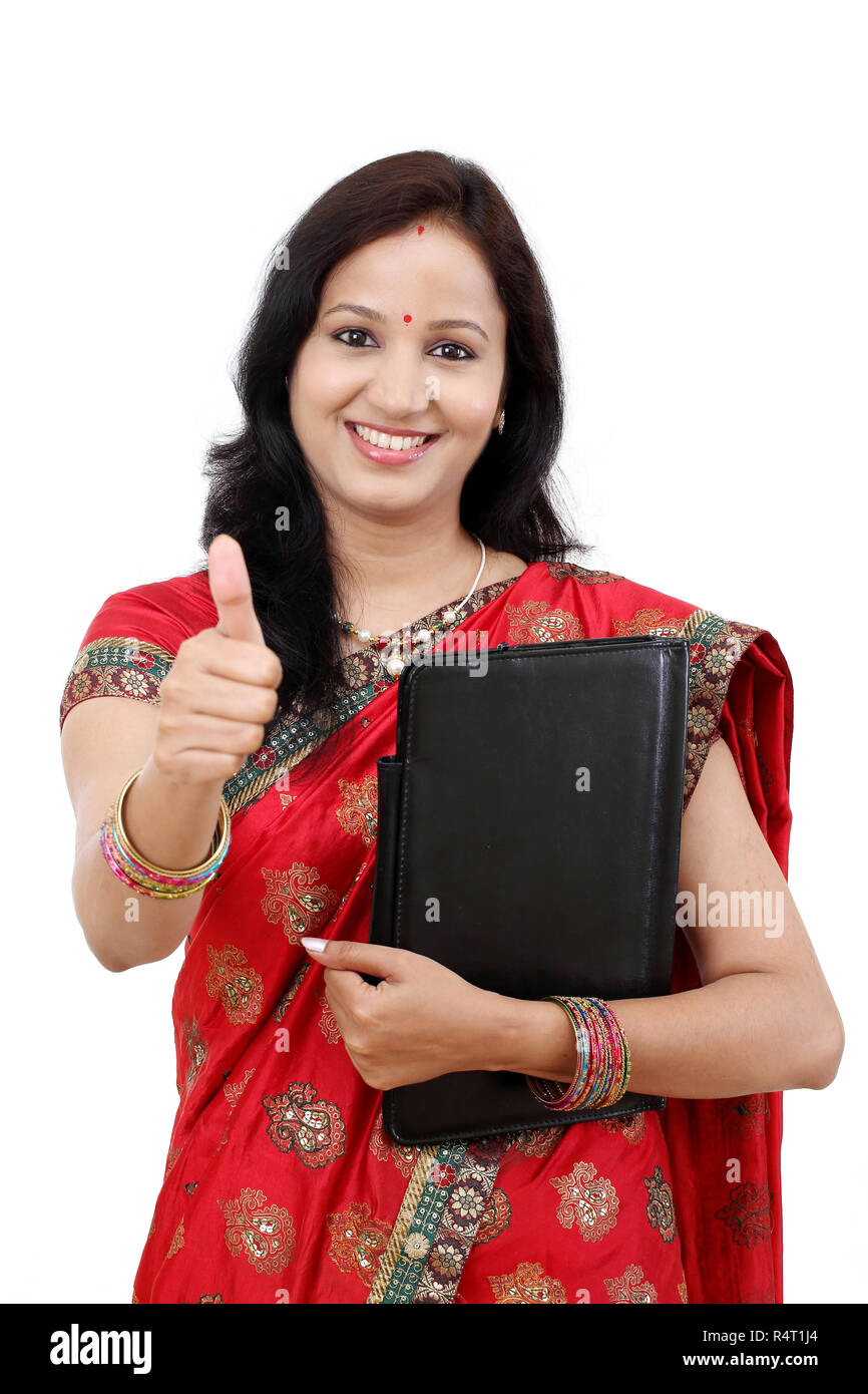 Traditional Indian woman showing thumbs up Stock Photo - Alamy