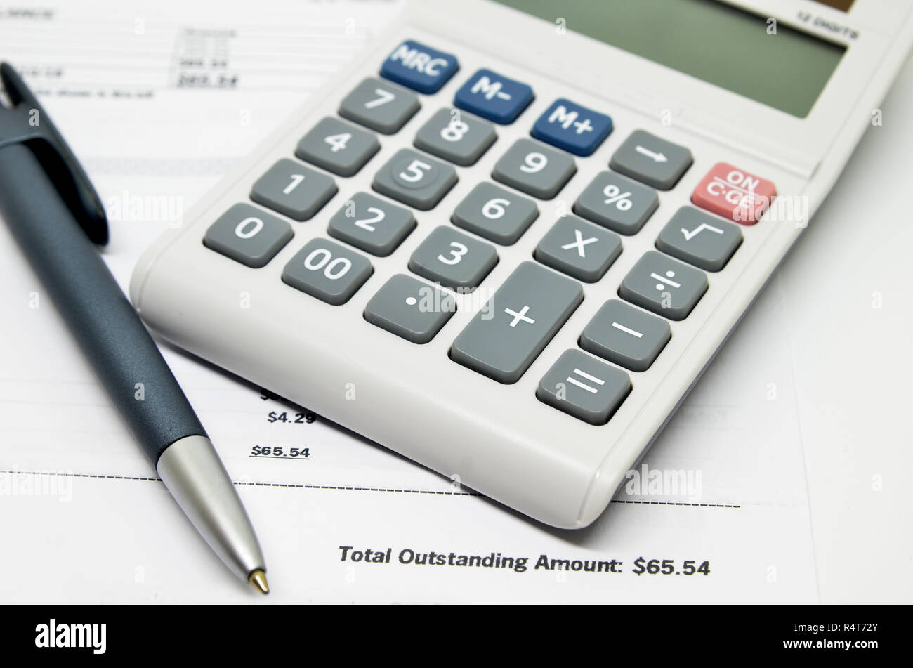 Calculating numbers for bill Stock Photo - Alamy