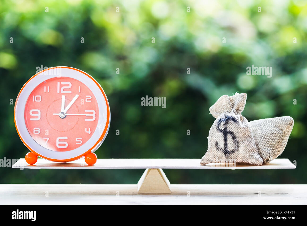Quality time money balance on hi-res stock photography and images - Alamy