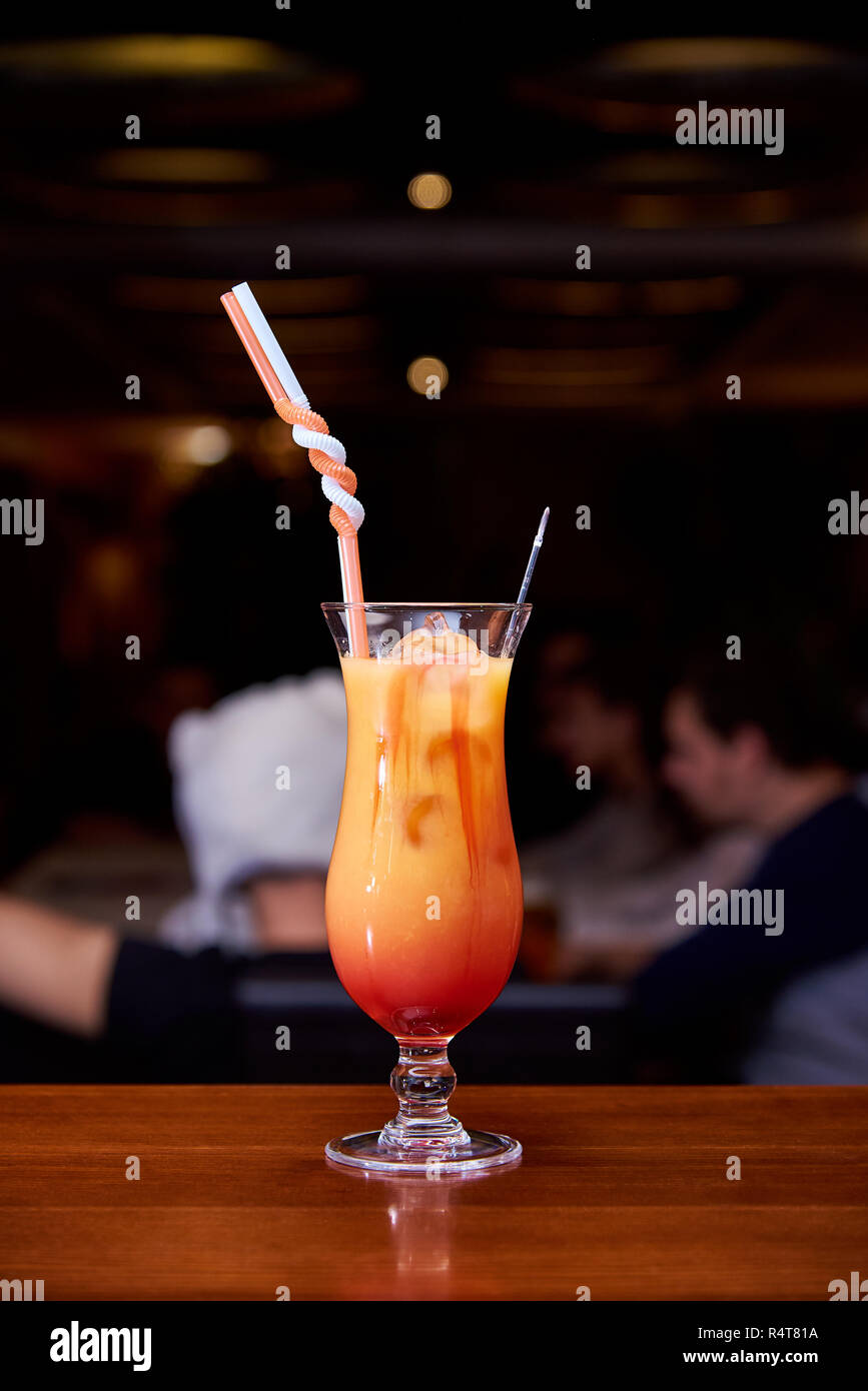 Bright cold cocktail on a dark background of the restaurant Stock Photo ...