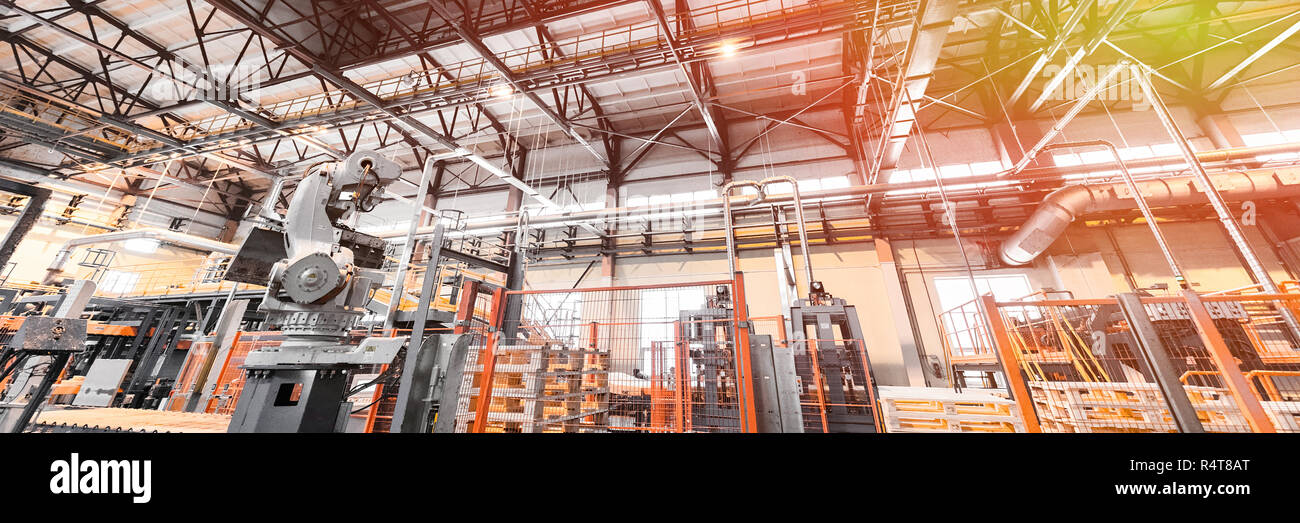 Fiberglass production industry equipment at manufacture background ...