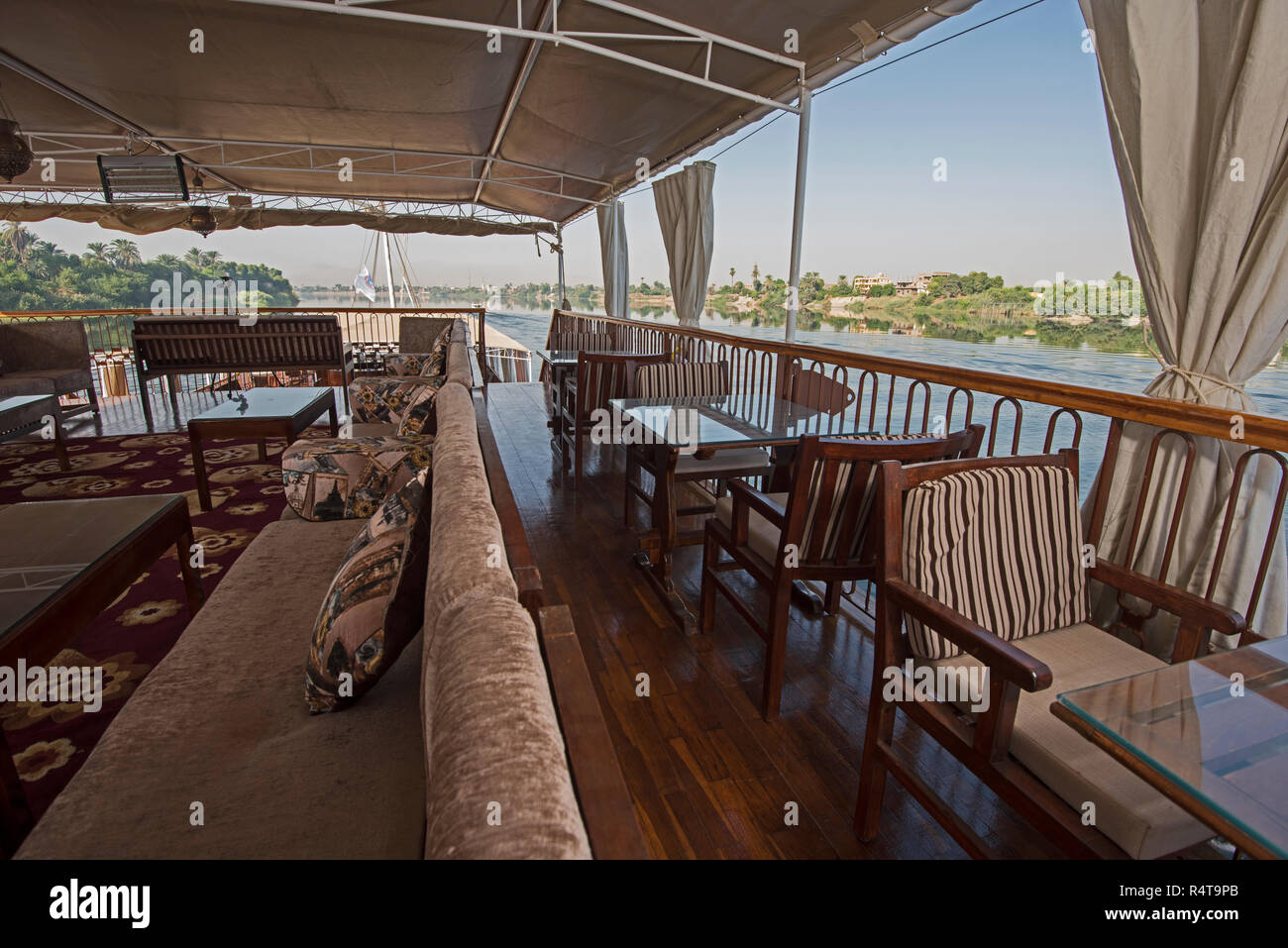 Seating sofa and table on the sundeck of a nile river cruise boat with ...