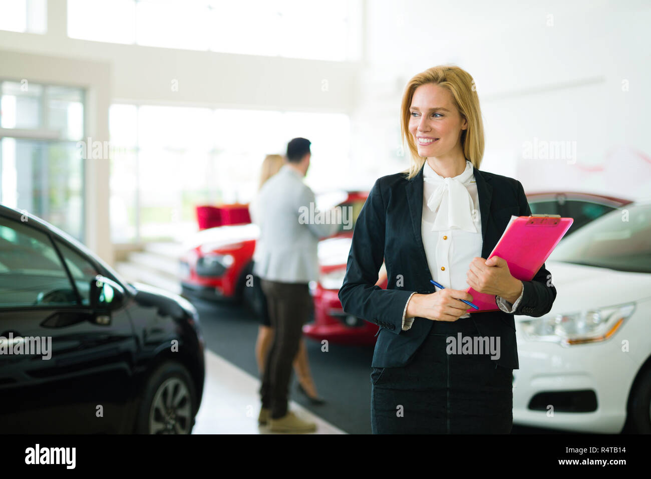 Saleswoman automobile hi-res stock photography and images - Alamy