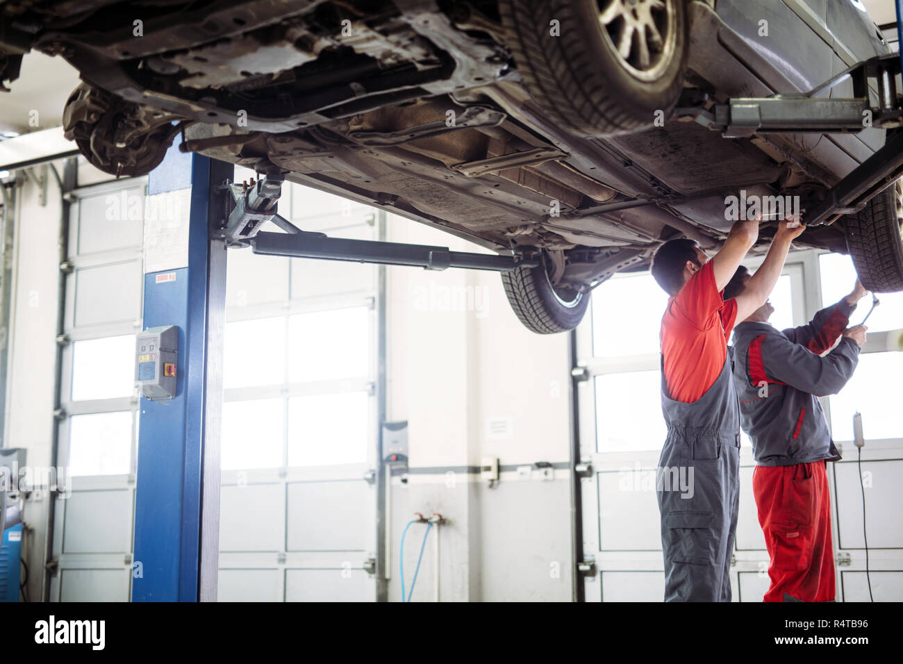 Lifted car in professional service hi-res stock photography and images ...