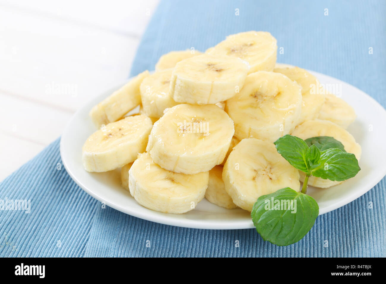 Little peeled yellow banana hi-res stock photography and images - Alamy