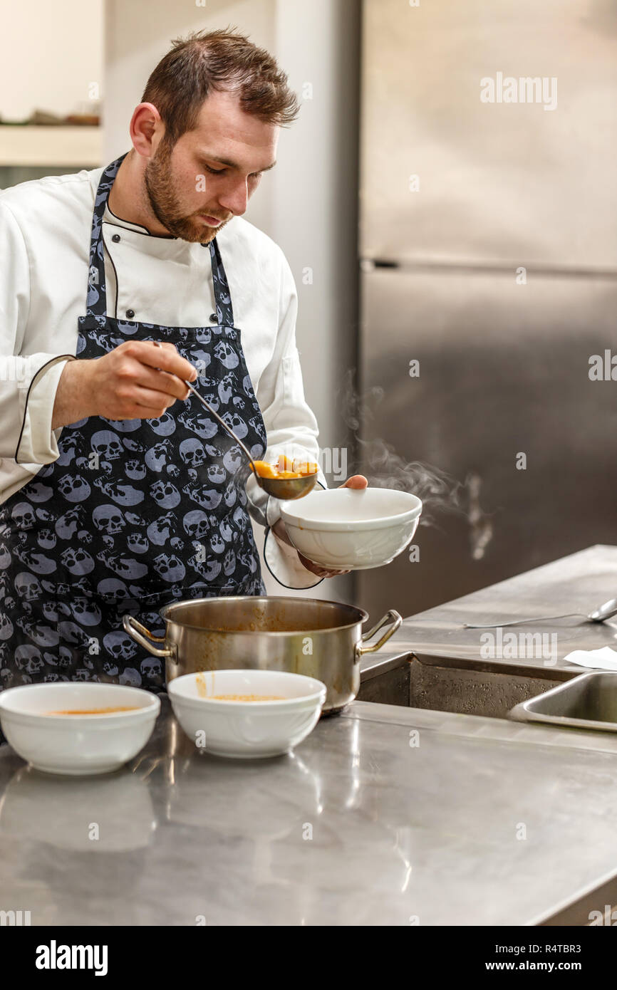 Pouring soup into pot hi-res stock photography and images - Alamy