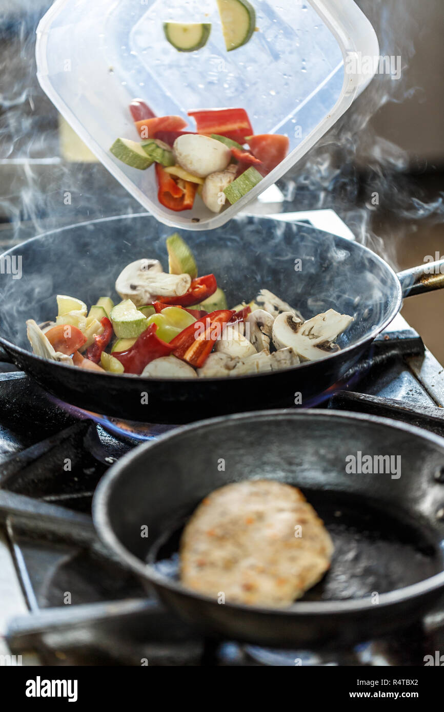Chef cooking lunch Stock Photo - Alamy