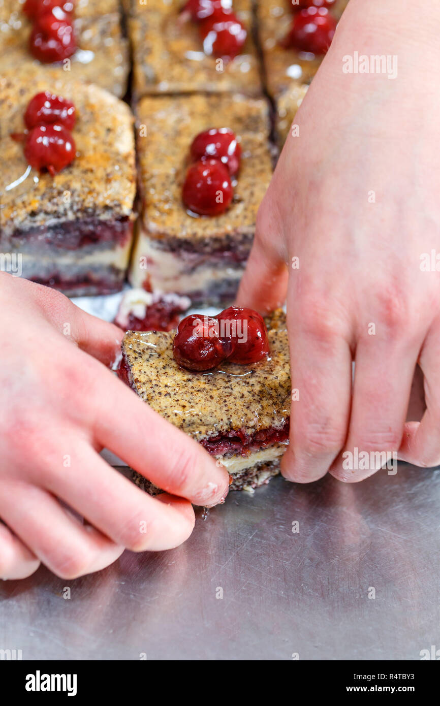 Chef is serving cake Stock Photo - Alamy