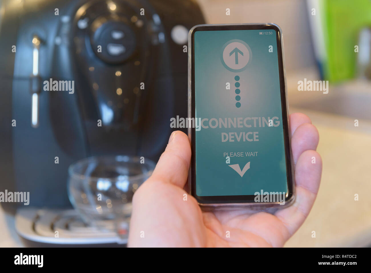 Connecting coffee machine with smart phone. Smart home and Internet of ...