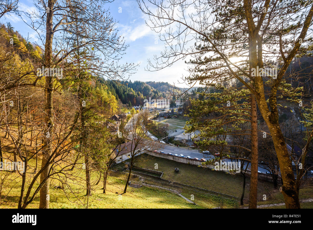 Bran city from castle view. Sun glowing at daylight. Blue sky. Romania ...