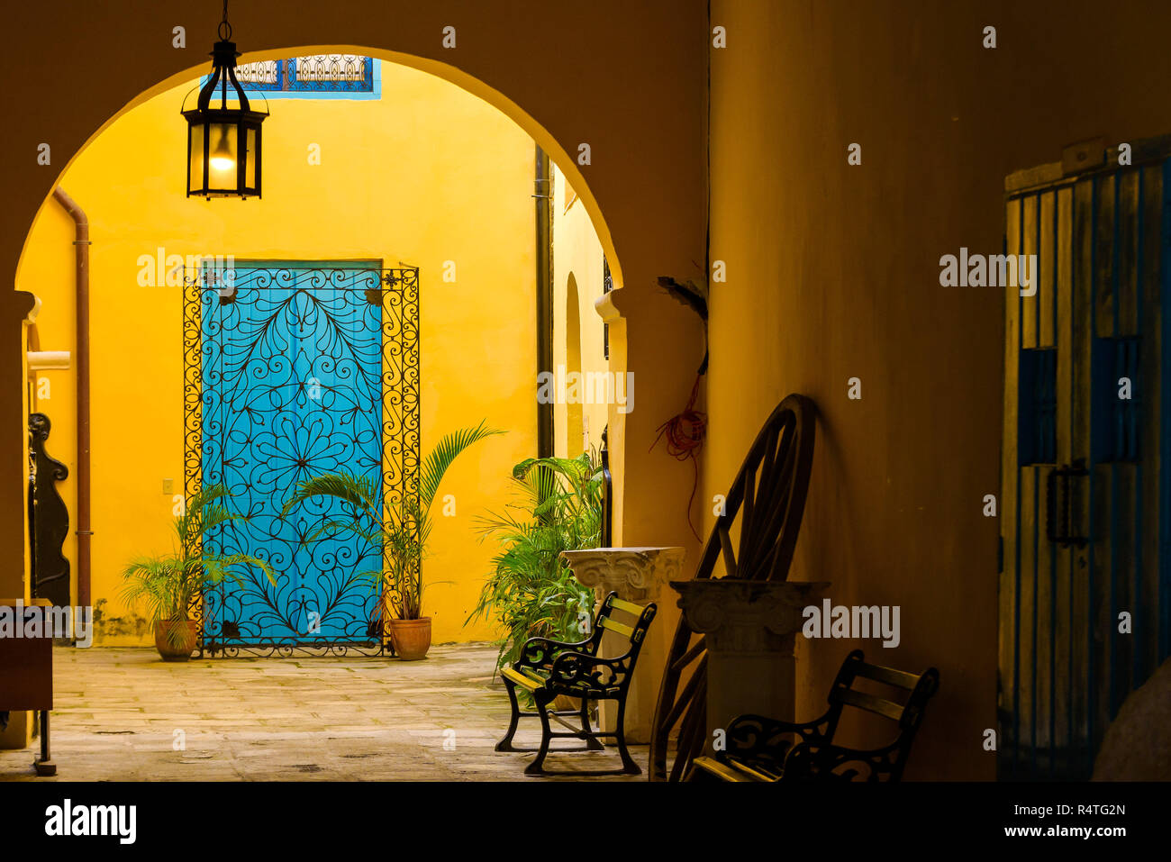 Traditional colorful Cuban architecture. Blue door facade and porch of ...