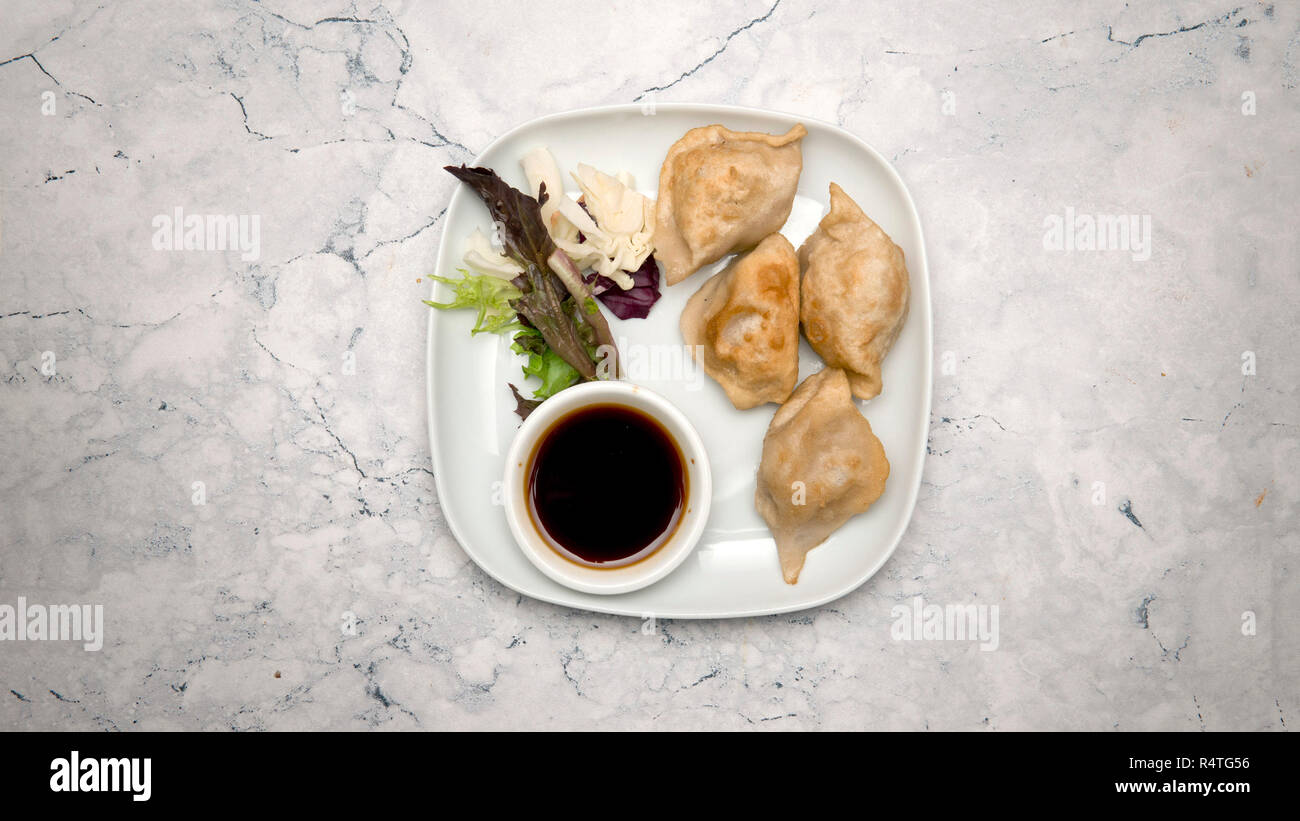 Oriental food, pork guo tie dumplings Stock Photo - Alamy
