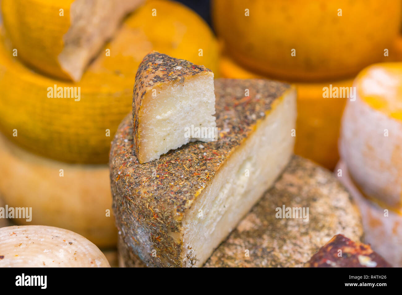 Craft cheese. Cheese head. Artisan cheese Stock Photo - Alamy