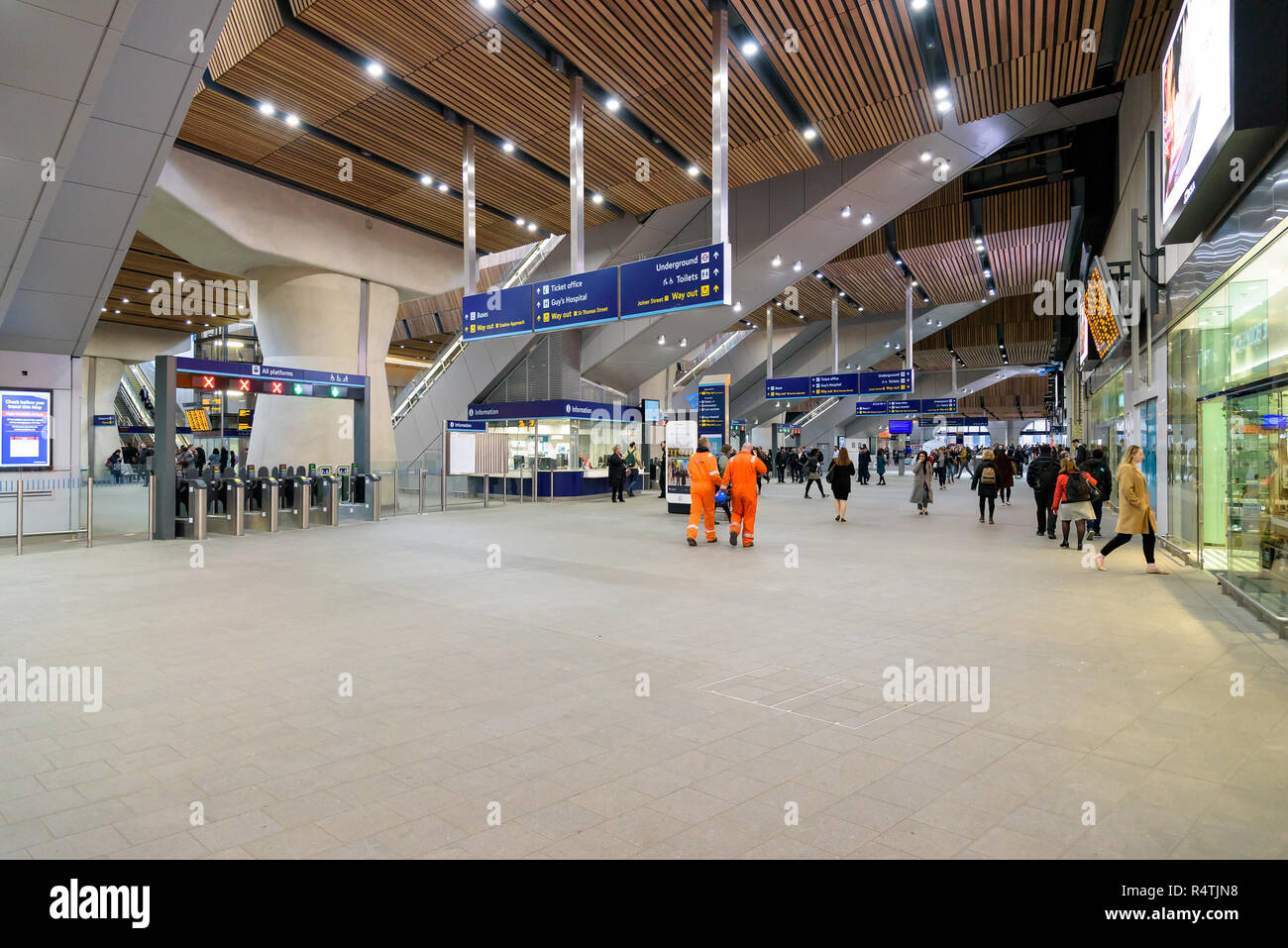 London, UK - April 26, 2018: Passengers at the London Bridge train ...