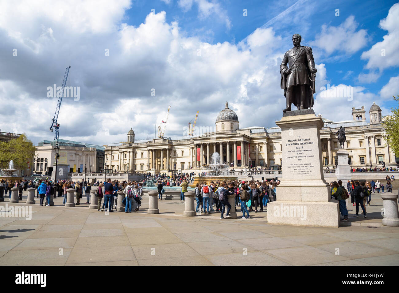 London, UK - Appril 26, 2018: Tourists visit Trafalgar Square, the most ...