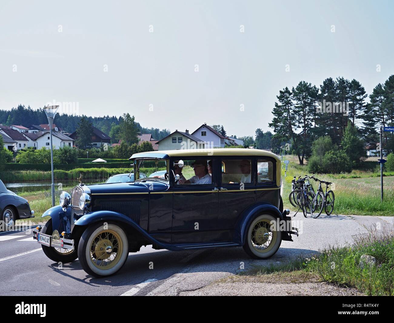 Blue-yellow oldtimer Ford-A with an Austrian registration number on the ...