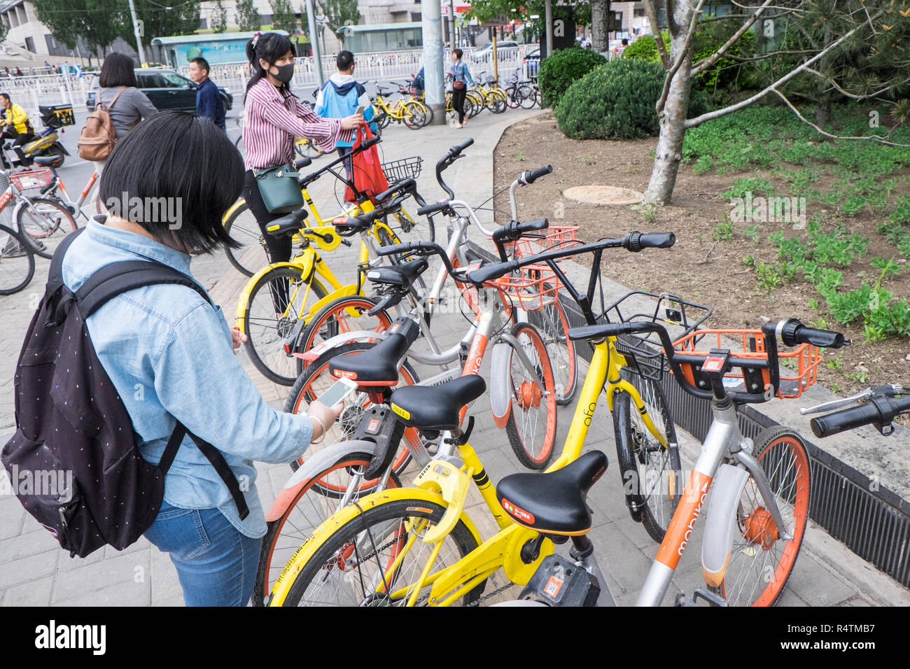 Using,mobile phone,app,to,access,dockless,bike,share,sharing,cycling ...