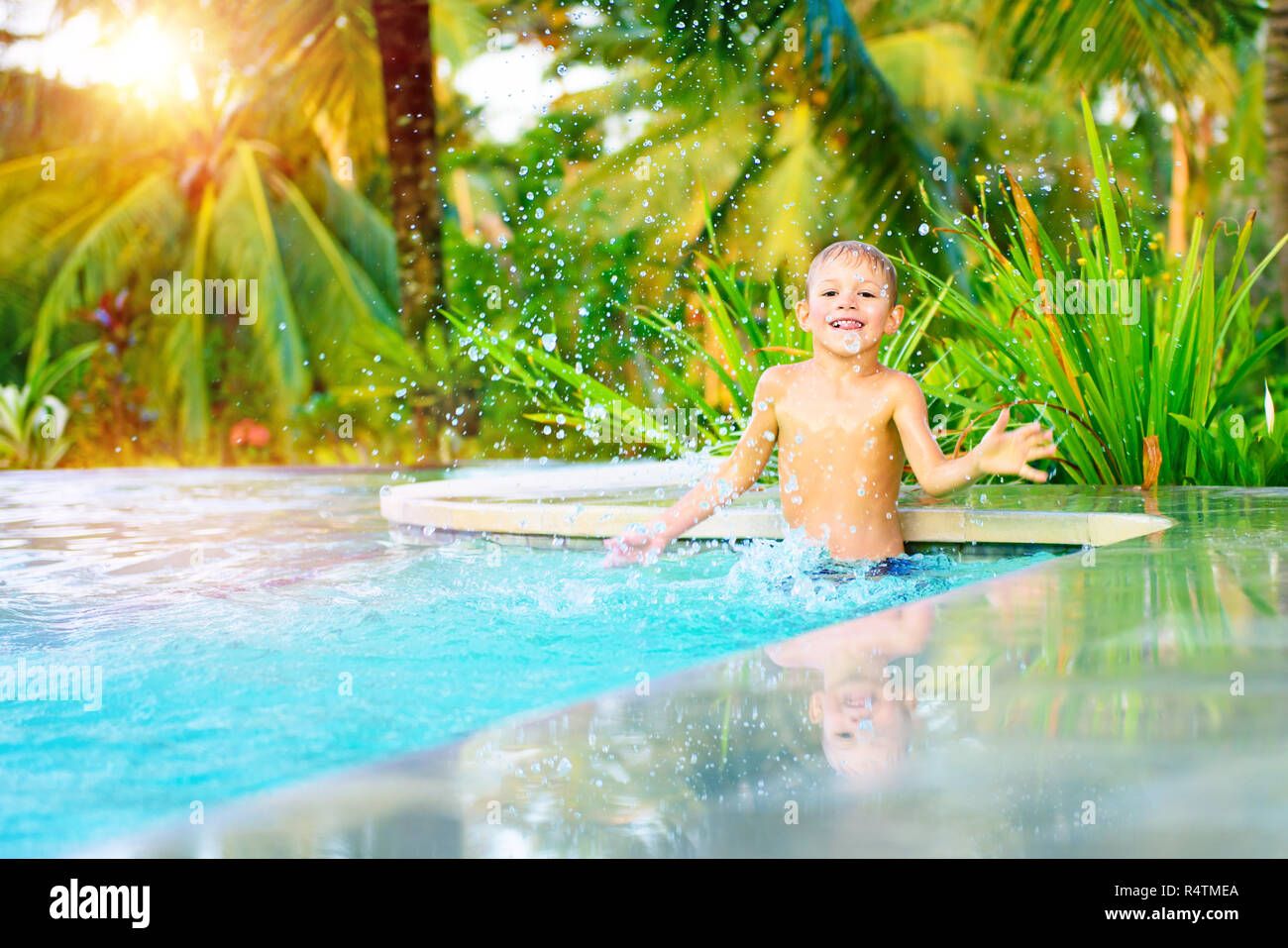 Little boy in the pool Stock Photo - Alamy